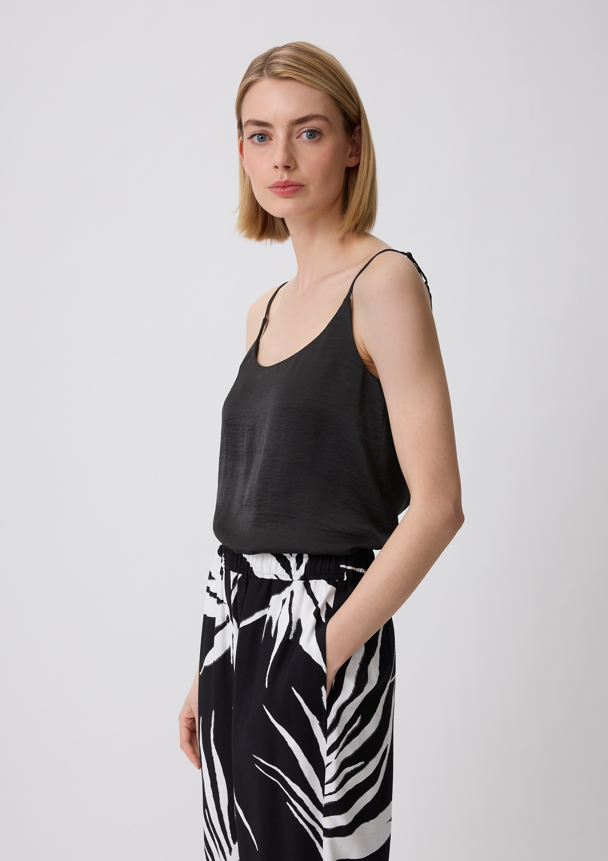 Top aus schimmerndem Jersey-Piqué - schwarz | Comma