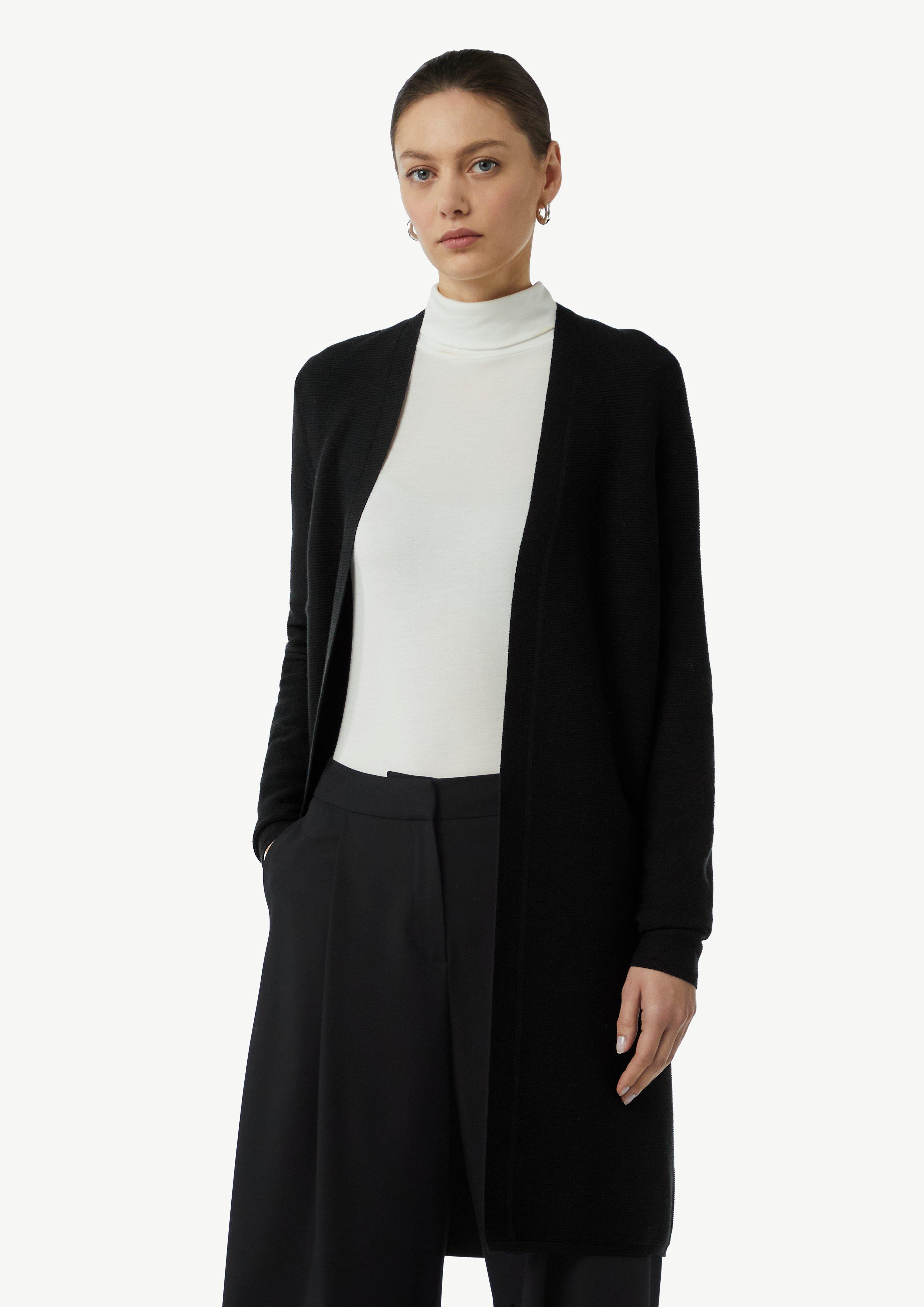 Long cardigan with ribbed cuffs and hem with side slits Long cardigan with ribbed cuffs and hem with side slits