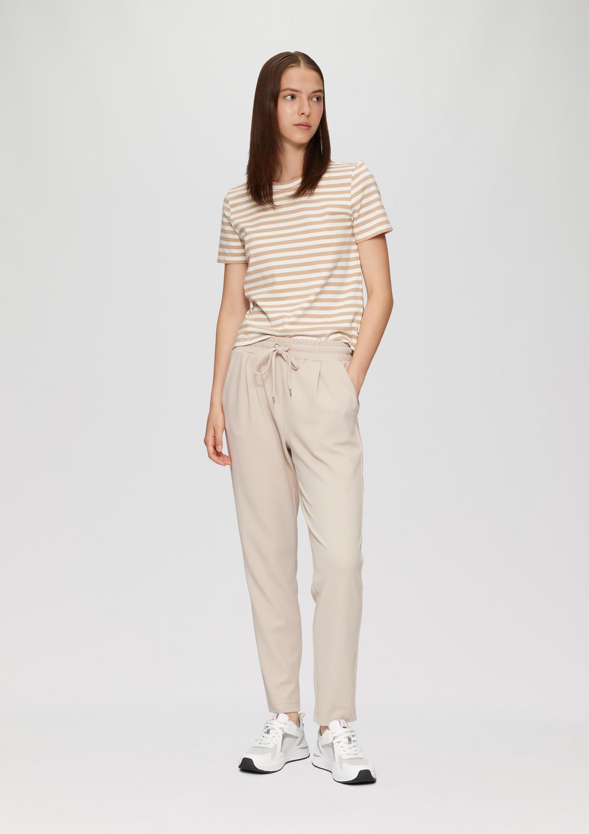 Tracksuit bottoms made of interlock crêpe - beige | s.Oliver