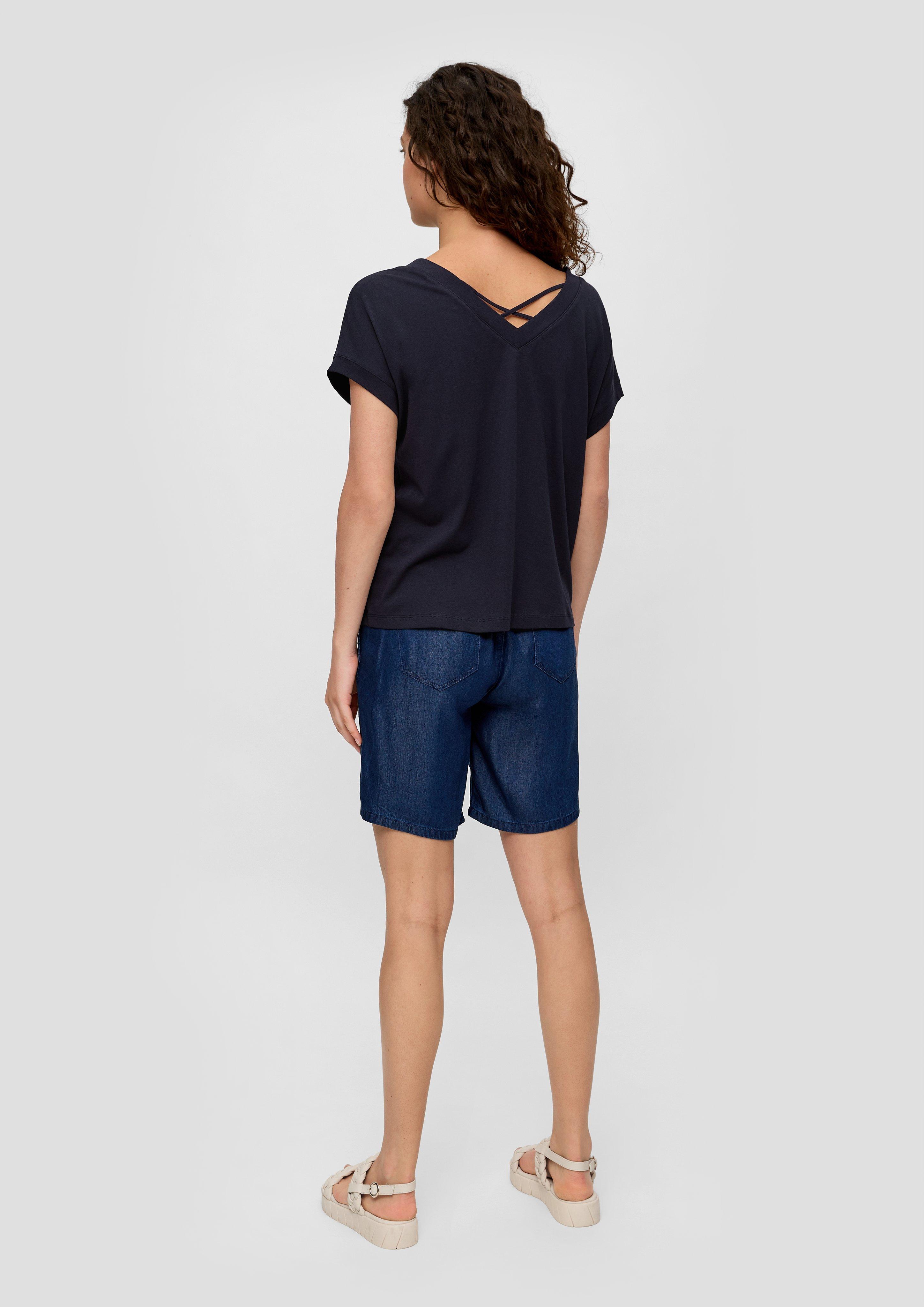 Top in a relaxed fit with a V-neckline and cross-over straps at the ...